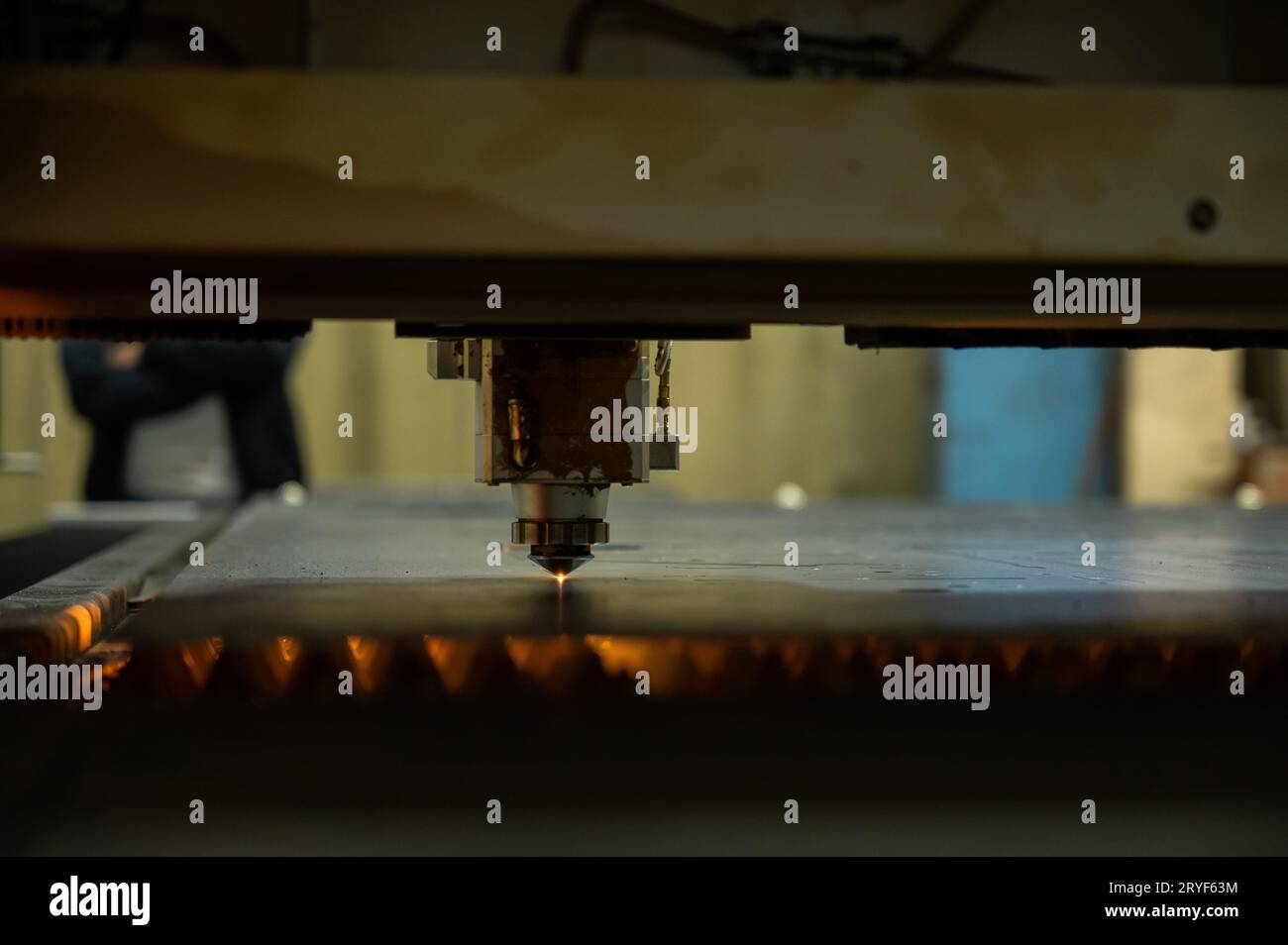 CNC machine. Laser cutting of metal. Sparks Stock Photo - Alamy