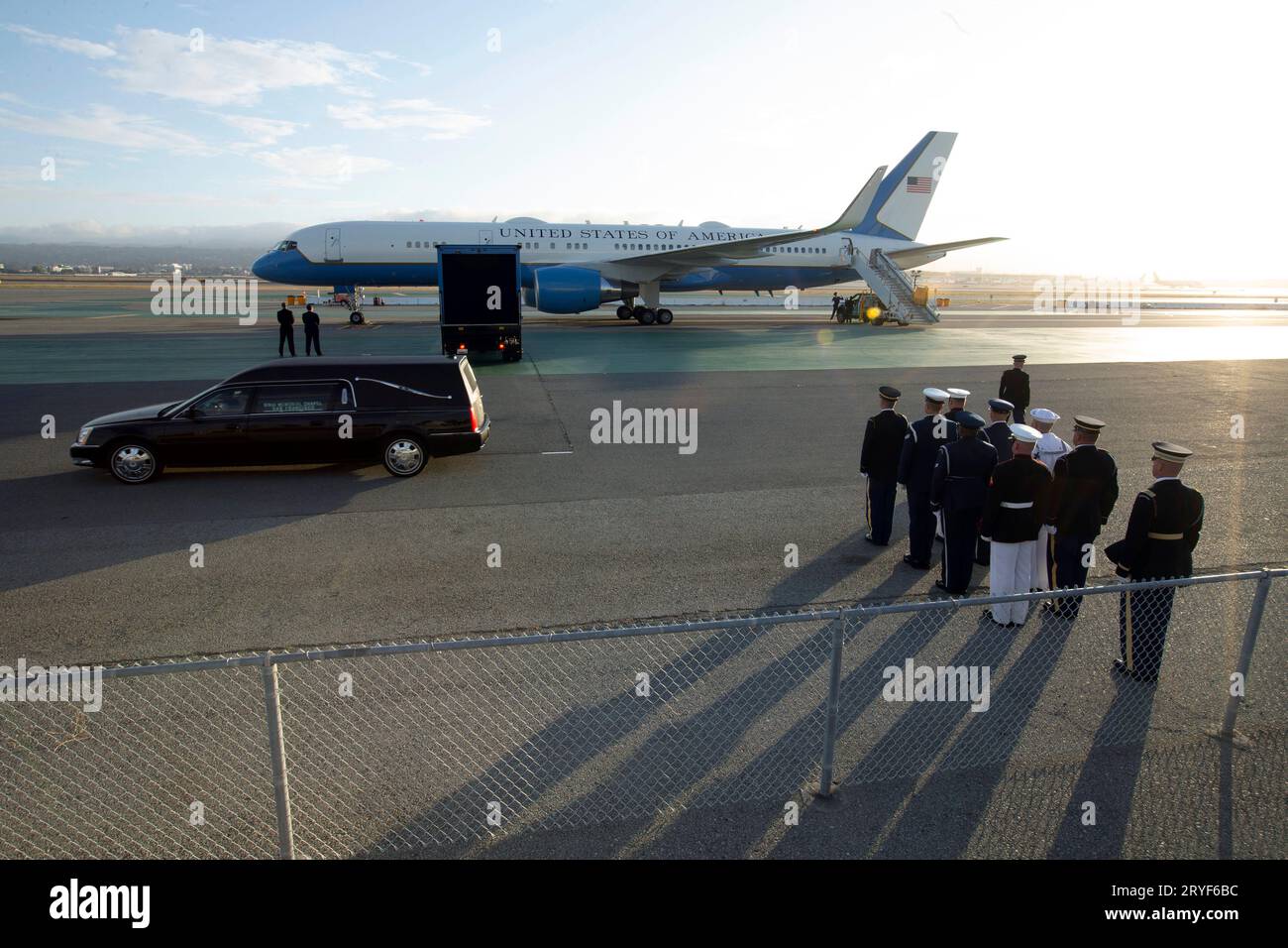 Officials gather at San Francisco International Airport to receive the ...