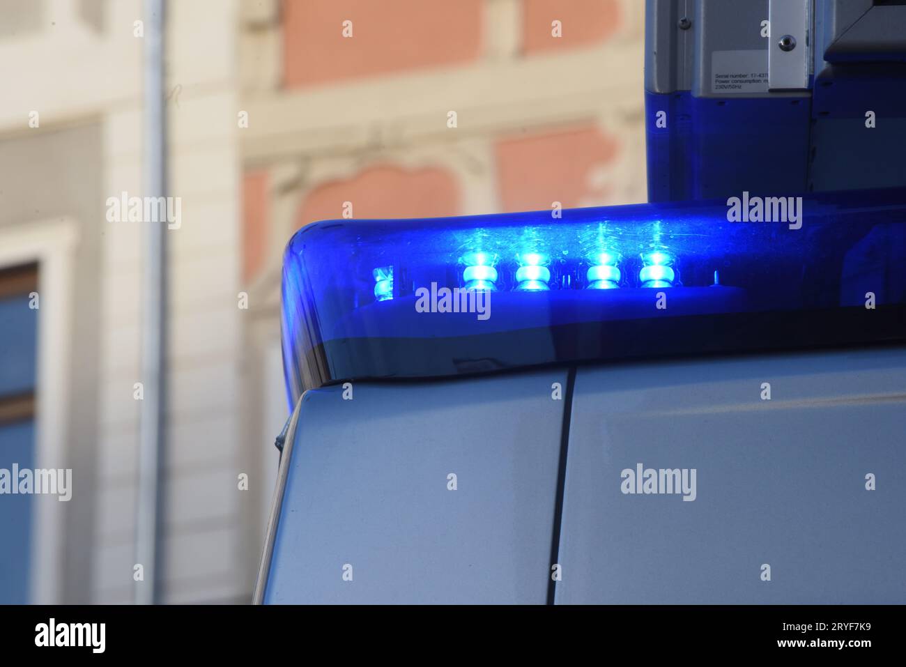 Blue light signal on a police car Stock Photo - Alamy