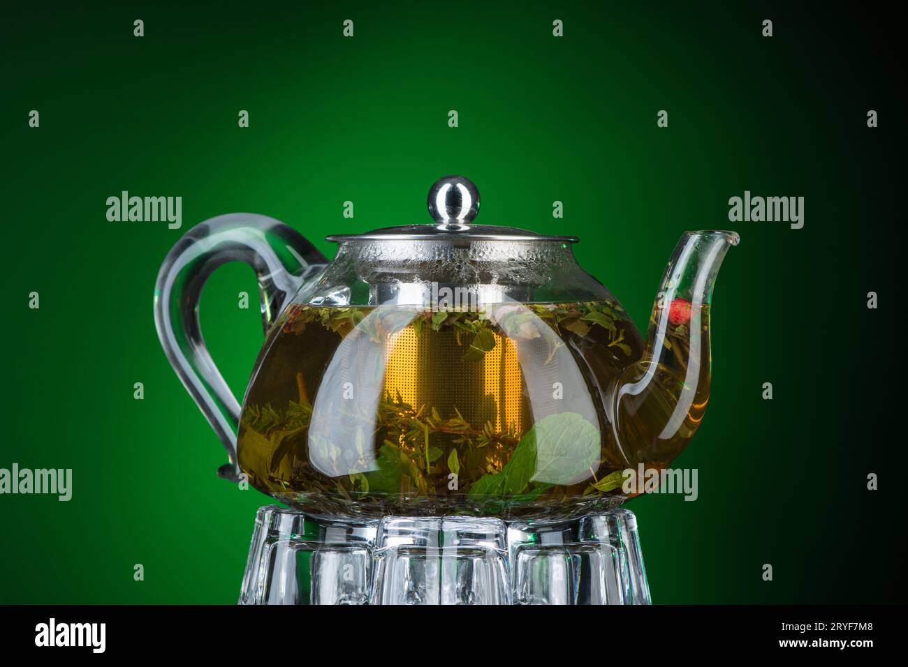 Mint tea in a transparent teapot Stock Photo - Alamy
