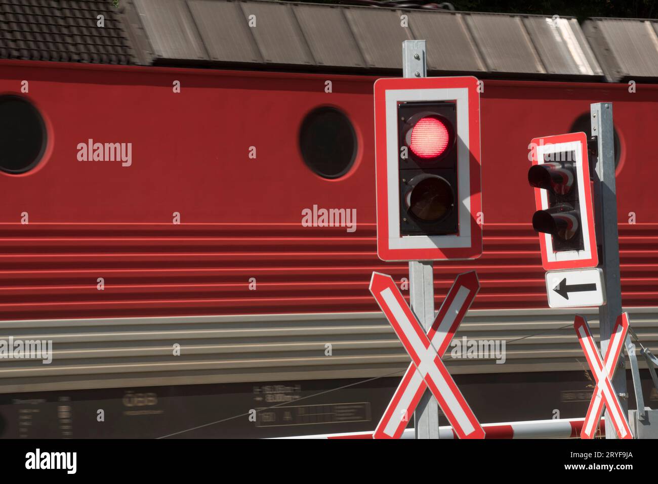 Railroad crossing in train traffic Stock Photo - Alamy
