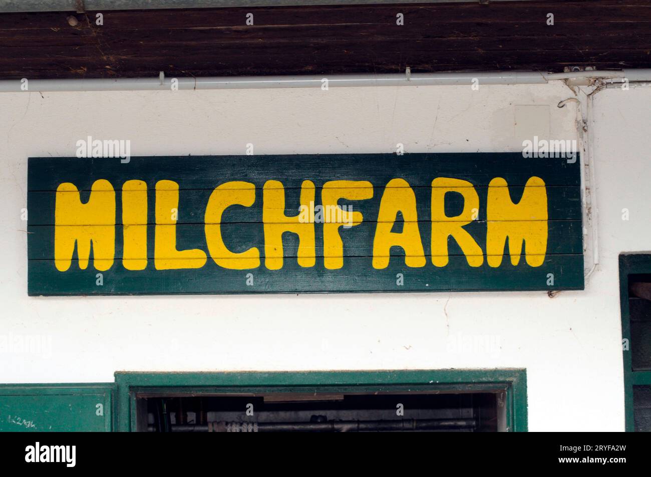 Milk farm sign in german (Milchfarm Stock Photo - Alamy