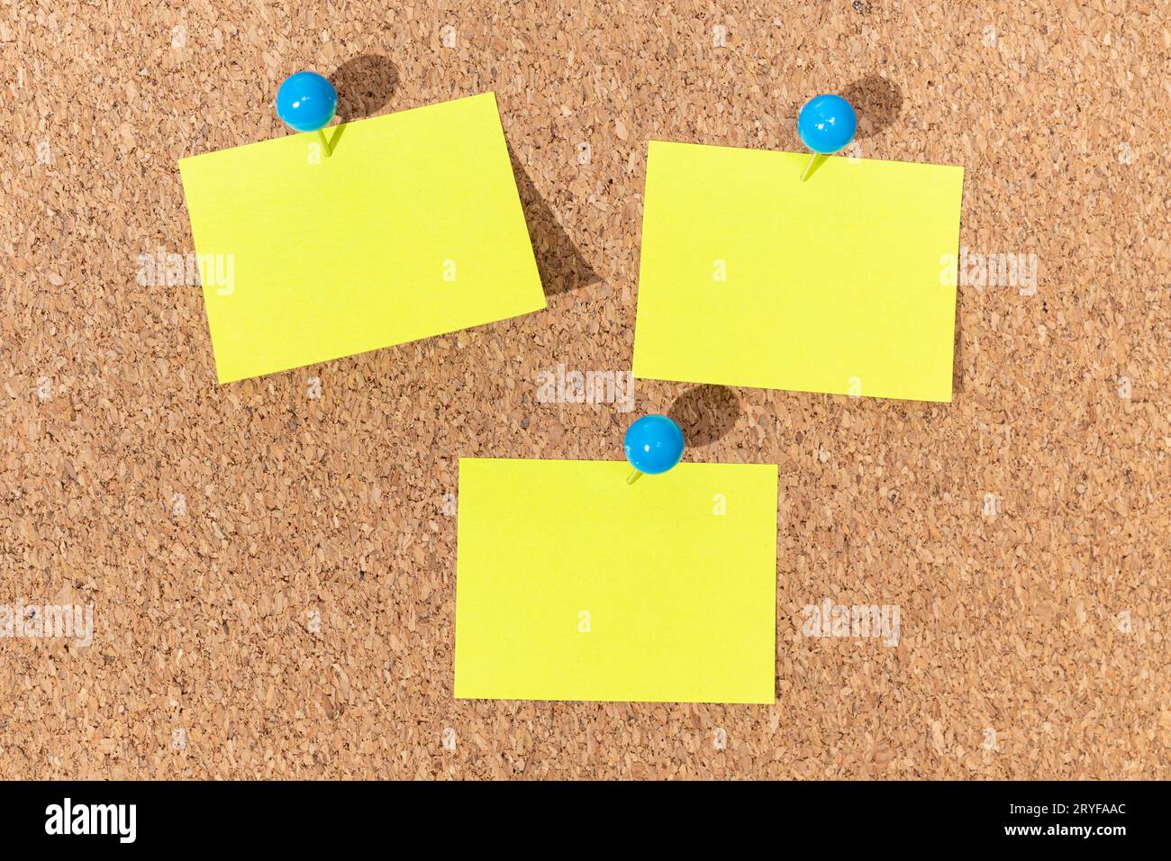 Group of Yellow sticky notes on a cork board for adding text. Template ...