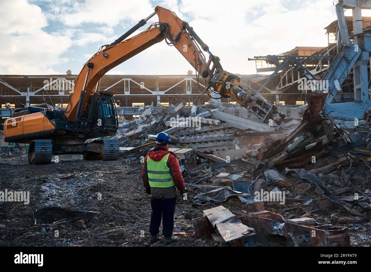 Hydraulic excavator removes concrete hi-res stock photography and ...