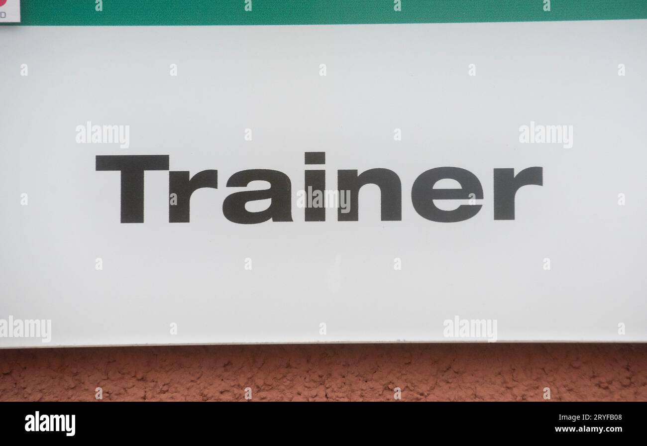 Sports trainer and training sign Stock Photo - Alamy