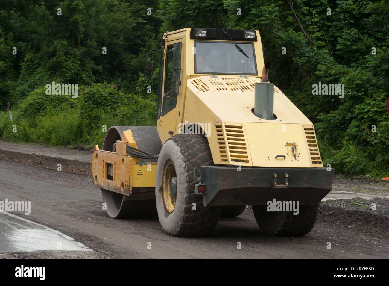 Road roller in construction and road work Stock Photo - Alamy