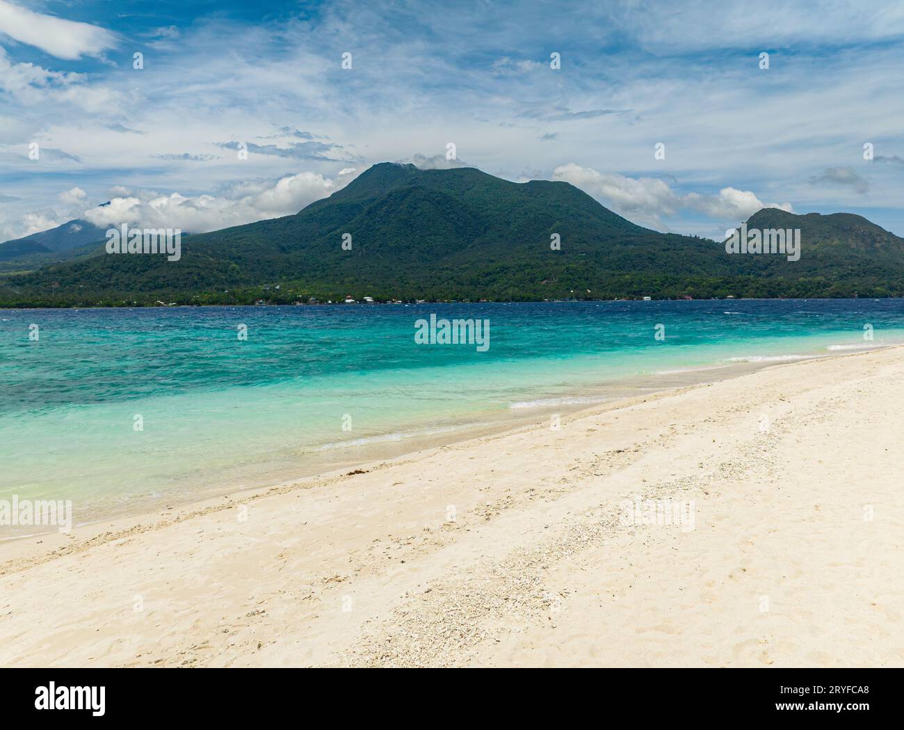 Sandy beach with ocean waves. Transparent turquoise sea water. White ...