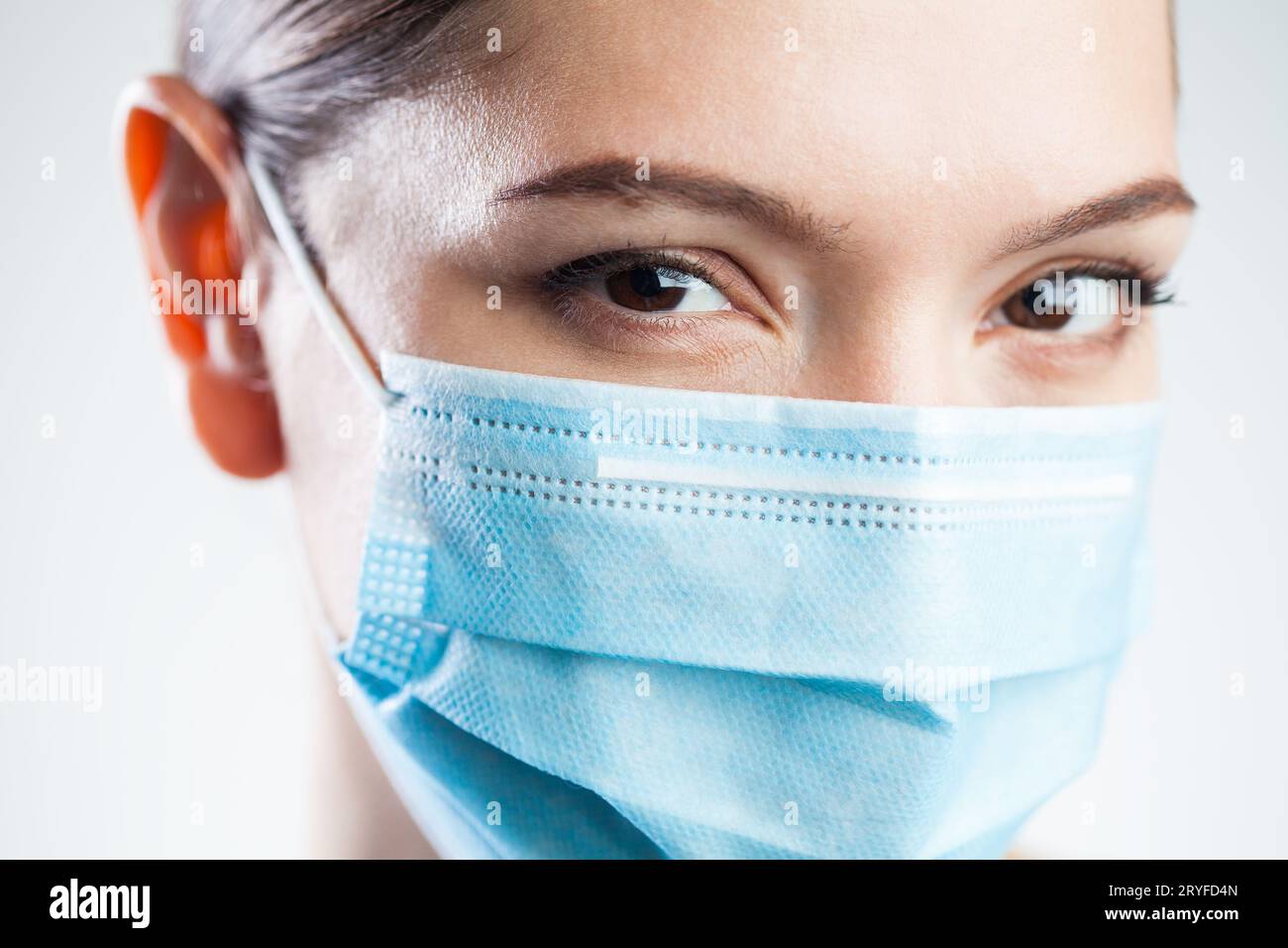 Intimate closeup portrait of attractive caucasian young woman wearing ...