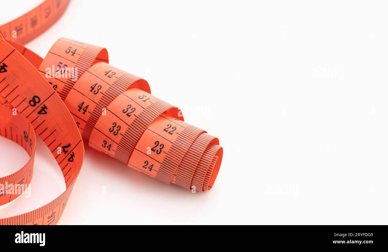 Red Measuring tape isolated on white background. Copy space Stock Photo ...