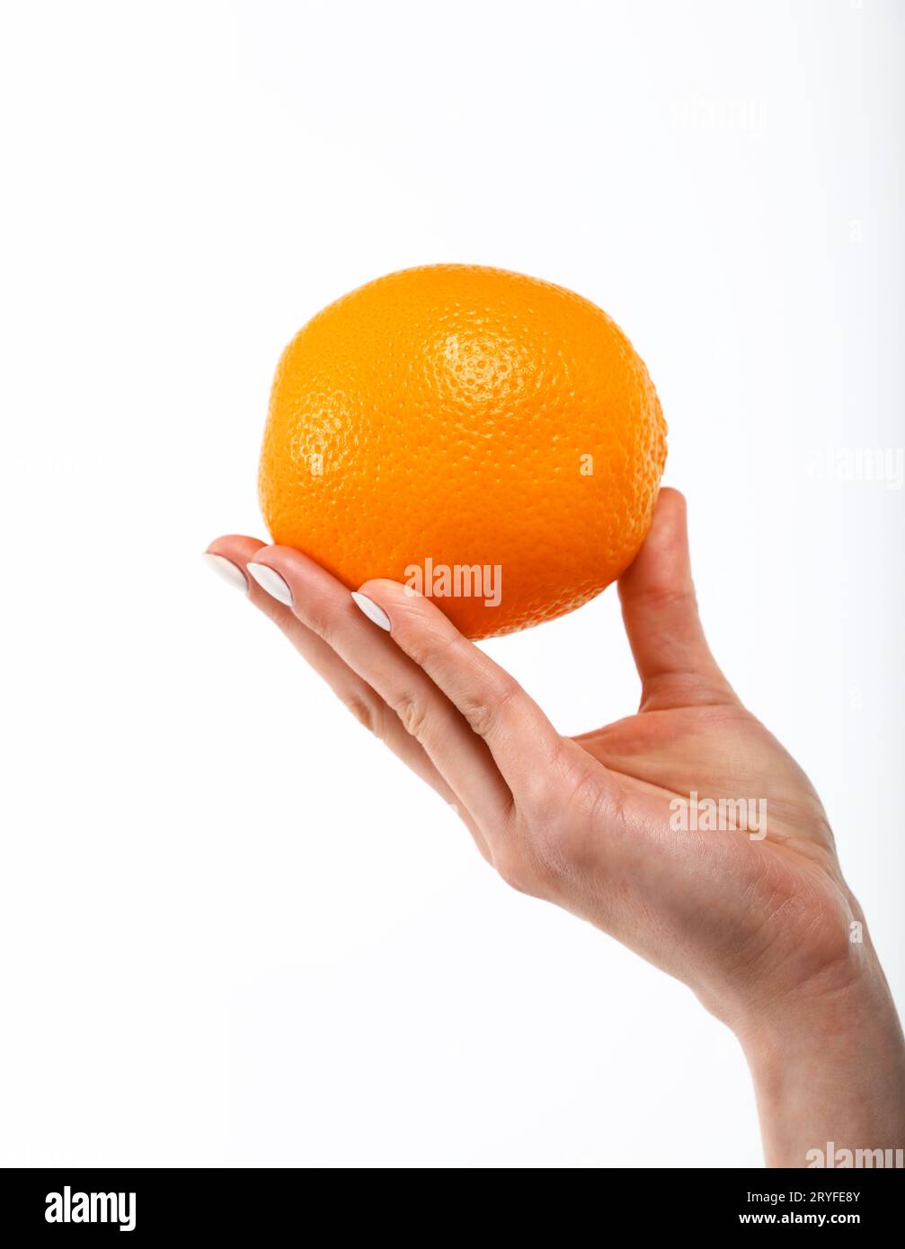 Woman hand cut orange hi-res stock photography and images - Alamy