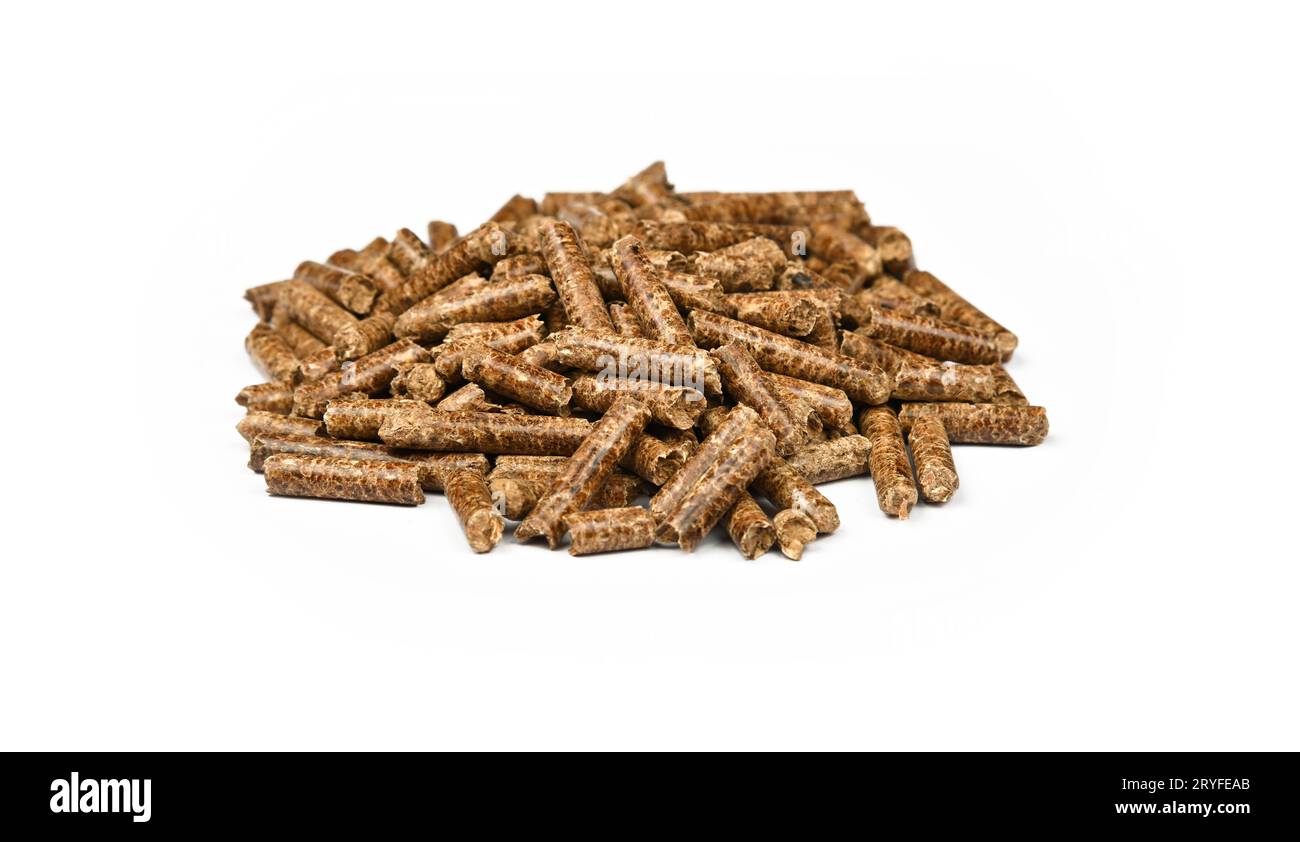 Heap of hardwood pellets for food smoking on white Stock Photo - Alamy