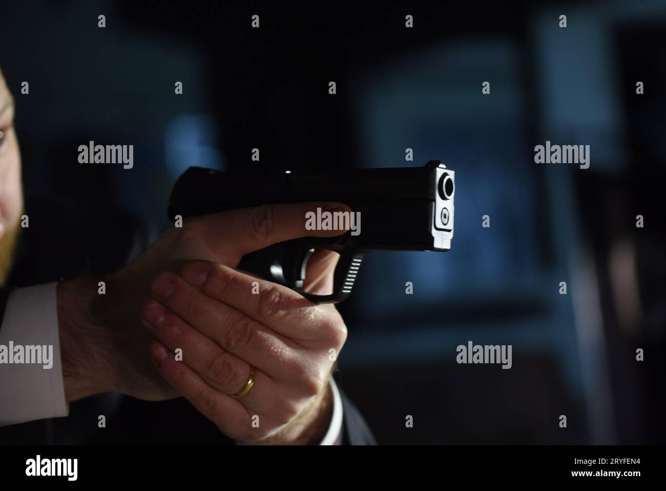 An attacker with a gun Stock Photo - Alamy