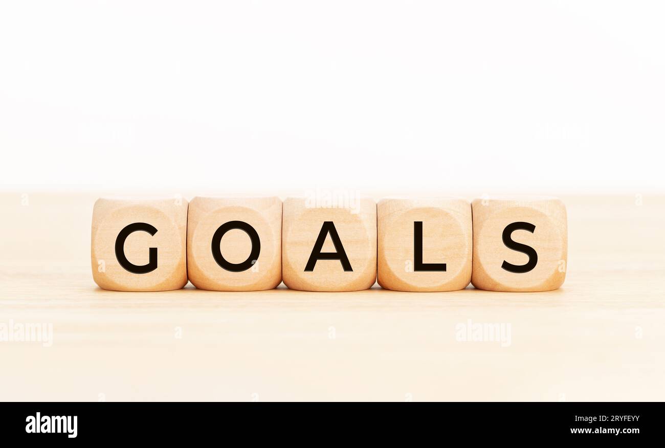 Goals word on wooden block shape. Copy space. White background Stock ...