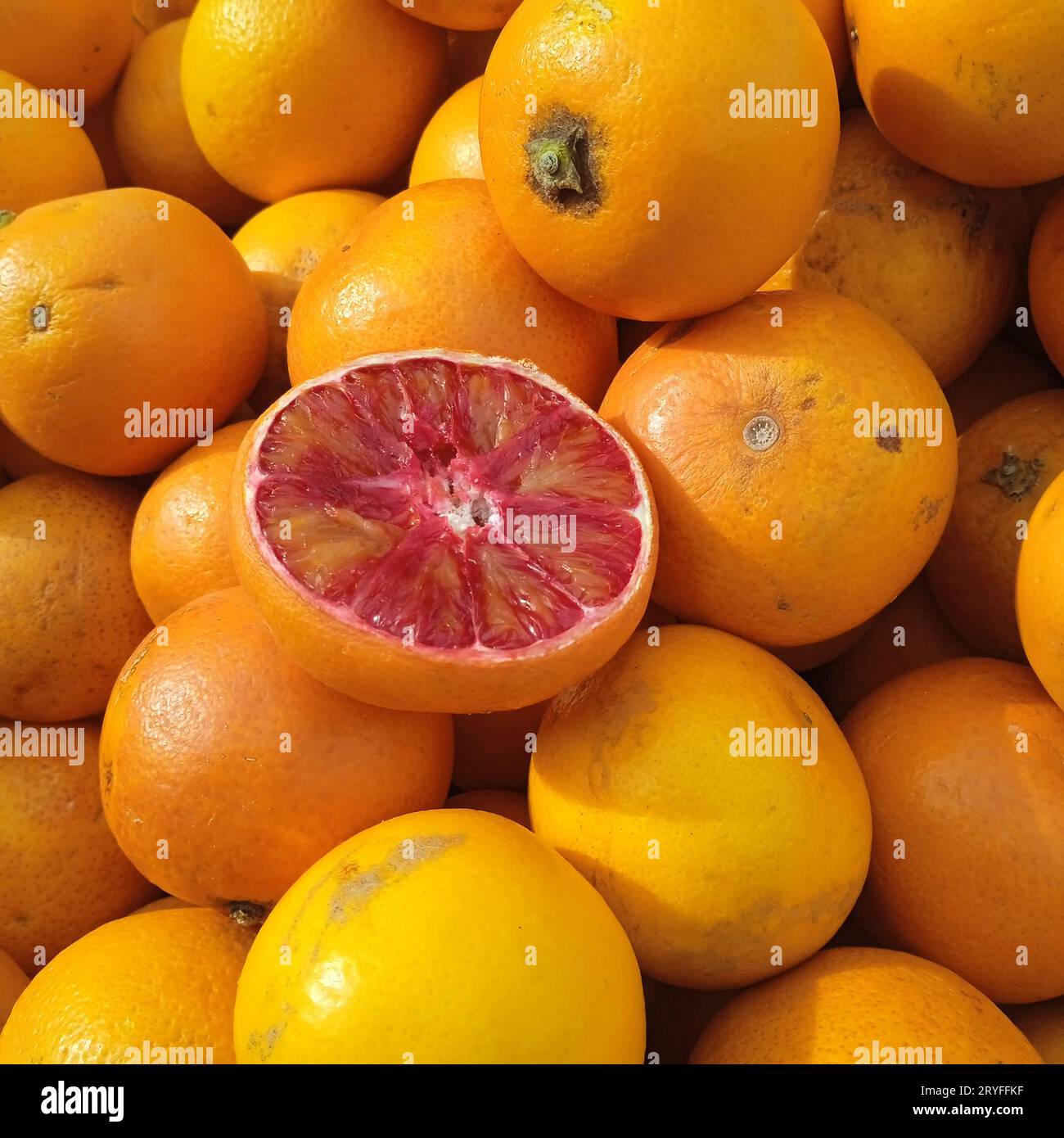 Ripe and juicy blood orange fruits Stock Photo - Alamy