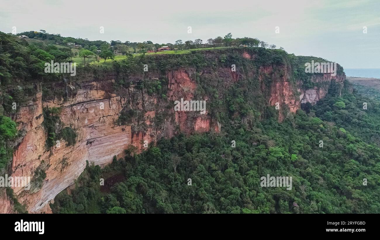 Close-up aerial view of towering cliffs with rainforest, Chapada dos ...
