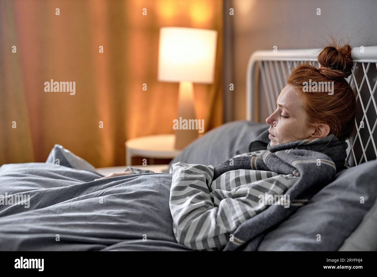 tired exhausted red-haired woman resting, pale poor girl sleeping ...