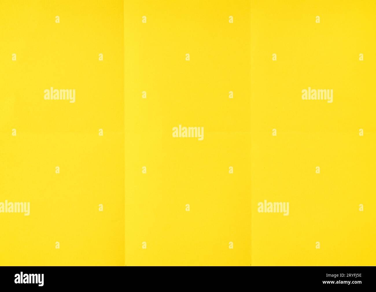 Yellow crumpled unfolded paper sheet texture background. Paper folded ...