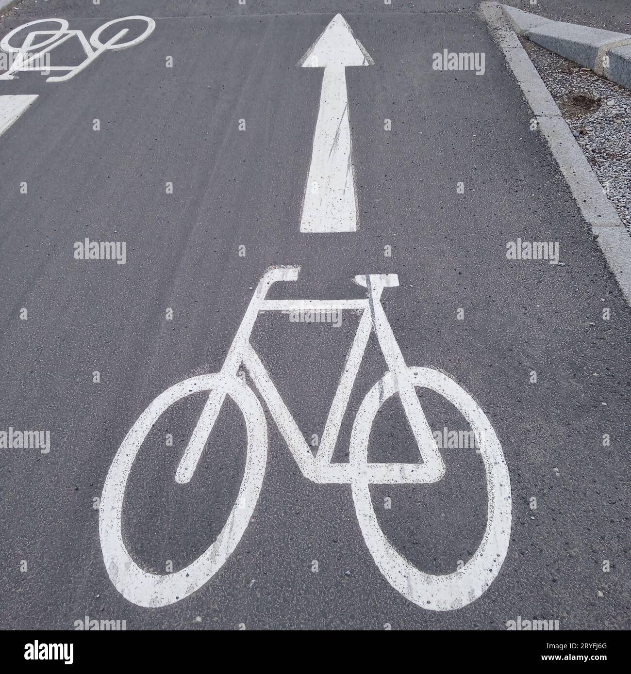 Bicycle path marking on the street Stock Photo - Alamy