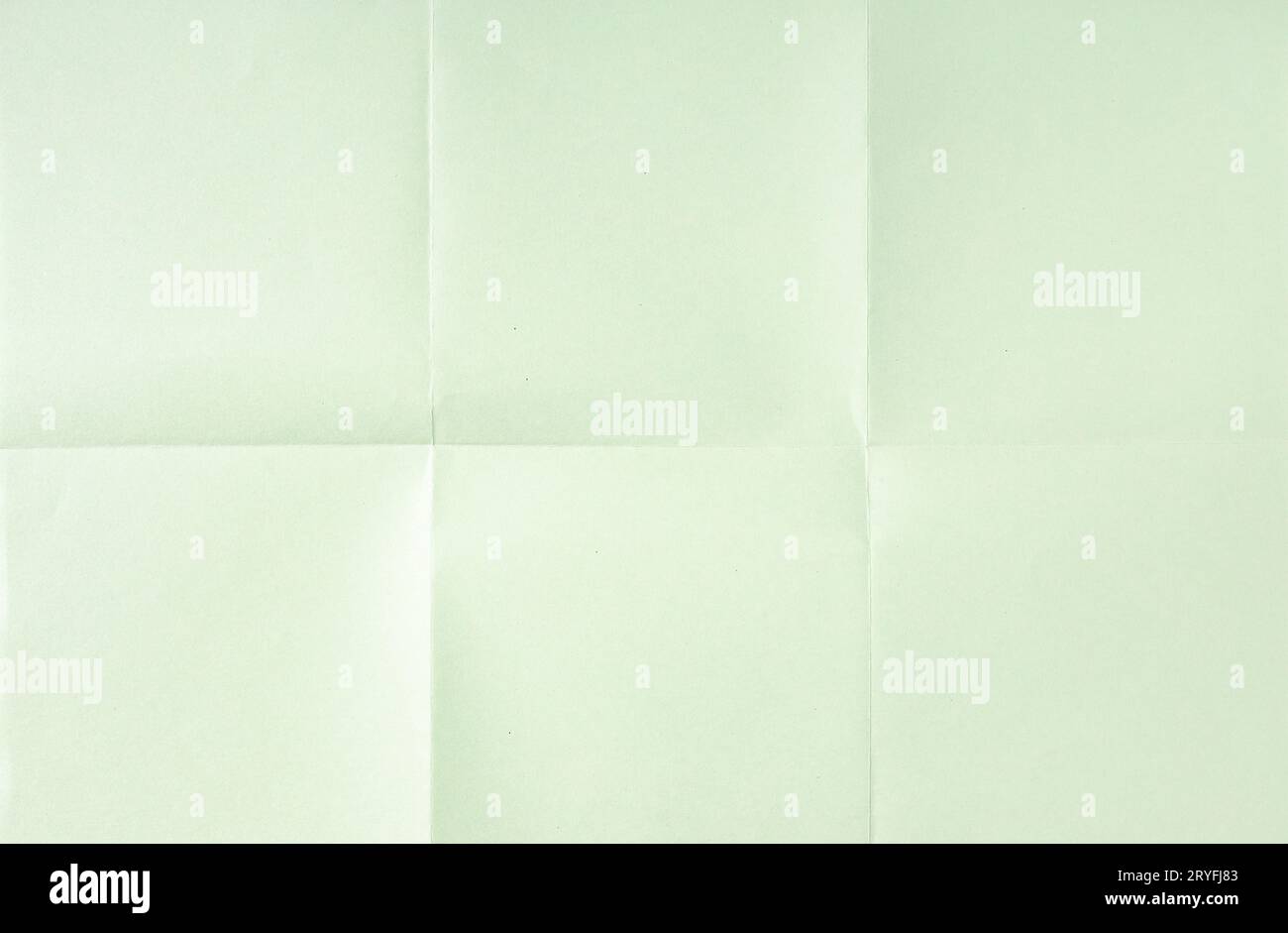 Light green crumpled unfolded paper sheet texture background. Paper ...