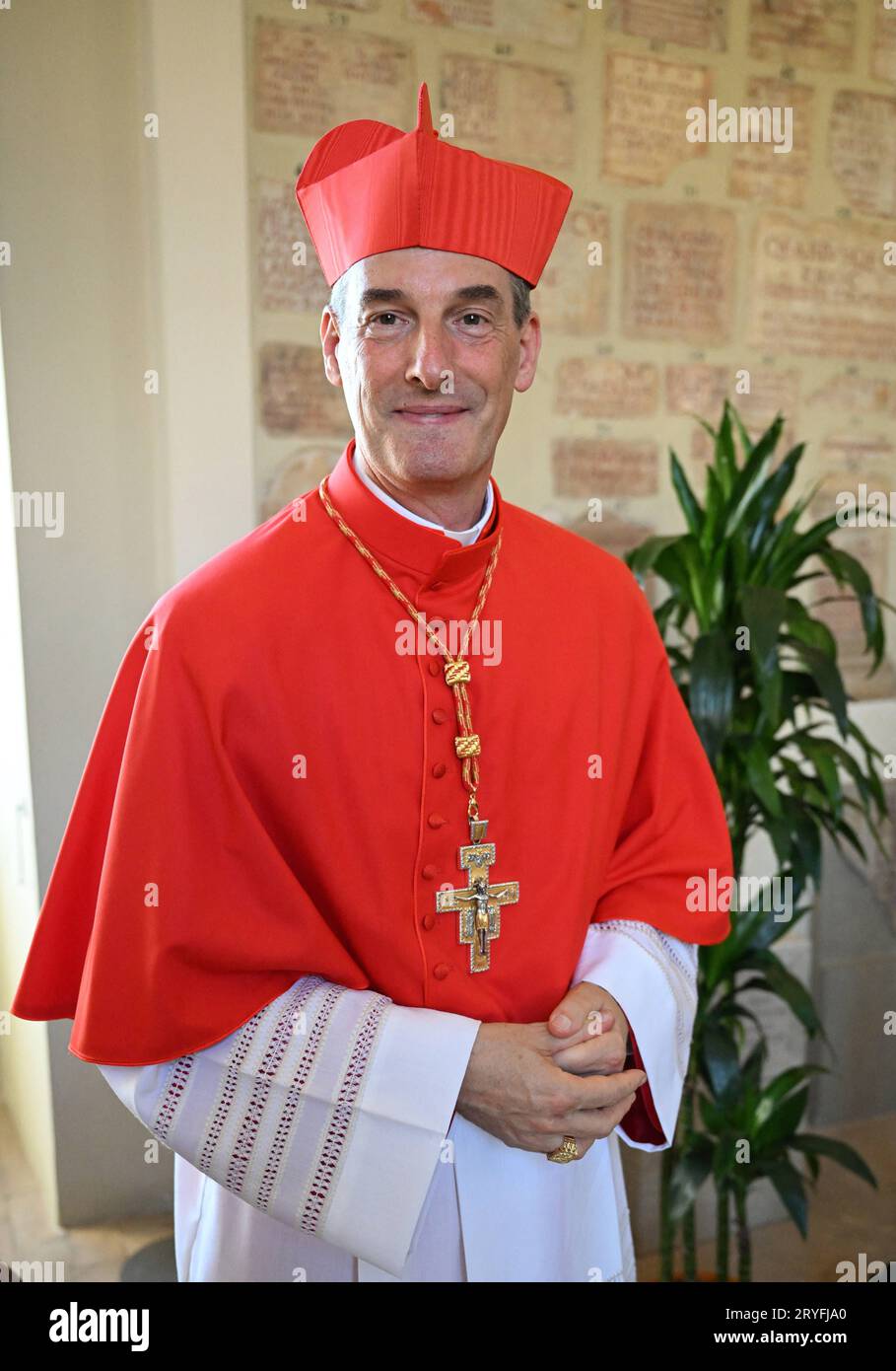 New cardinal Francois-Xavier Bustillo (France) poses as he meets with ...