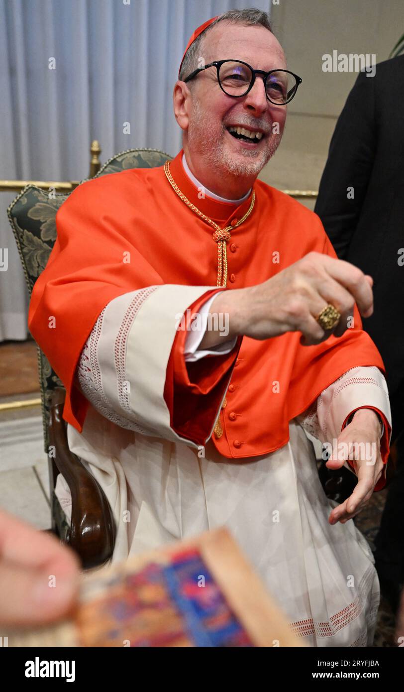 New cardinal Claudio Gugerotti (Italy) poses as he meets with relatives ...
