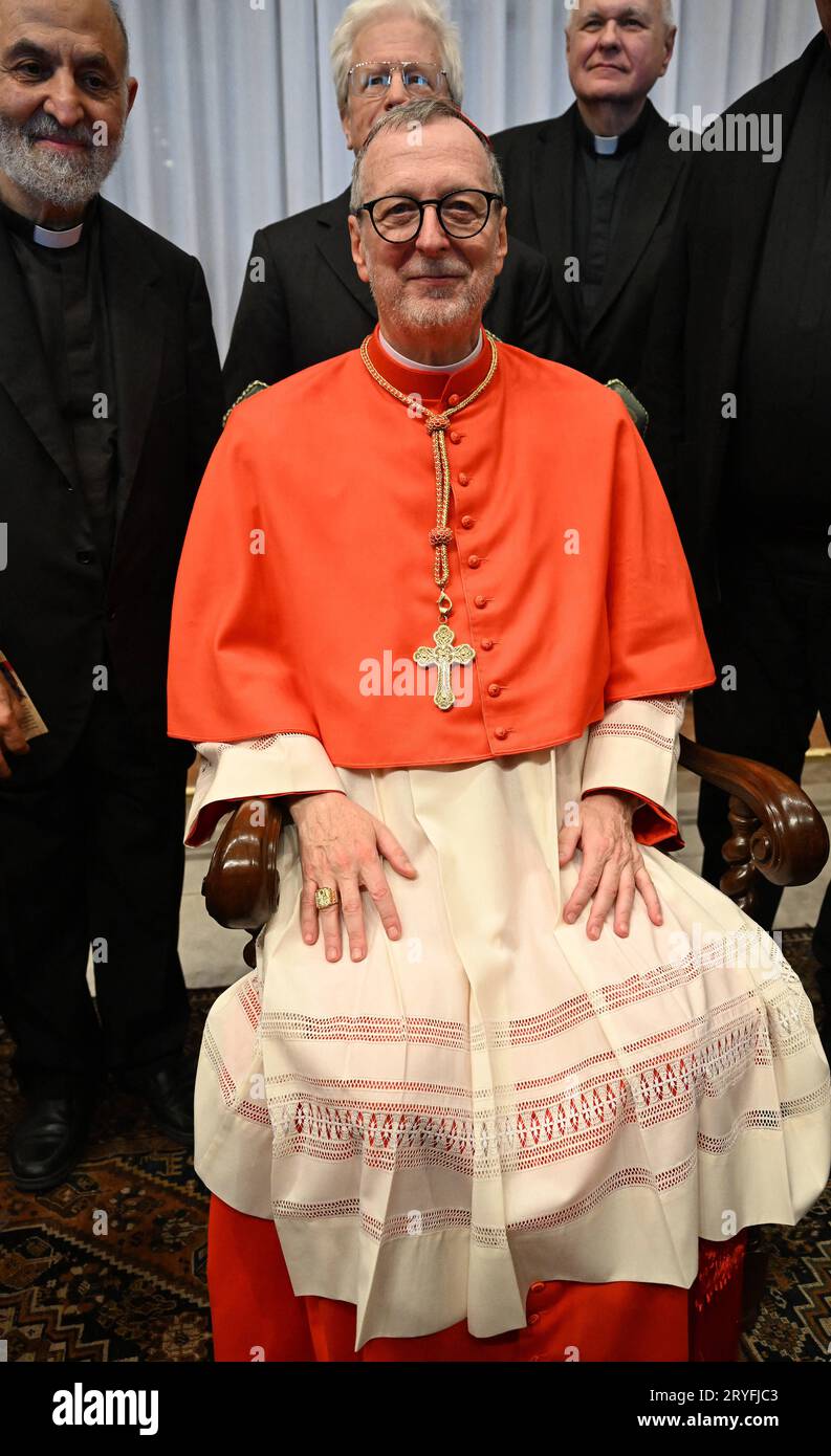 New cardinal Claudio Gugerotti (Italy) poses as he meets with relatives ...