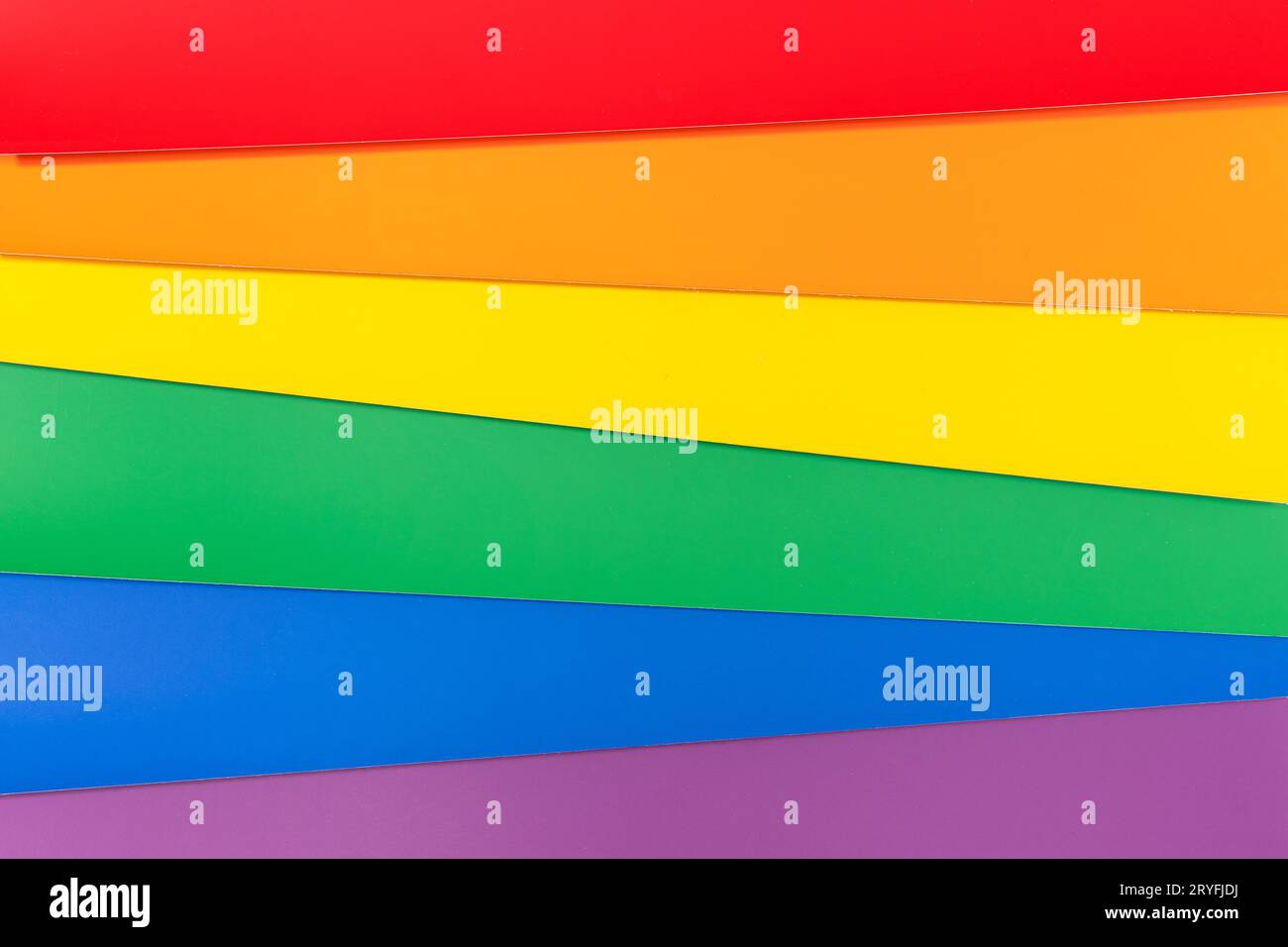 LGBT Rainbow flag background. Group of colored cardboard. Gay pride ...