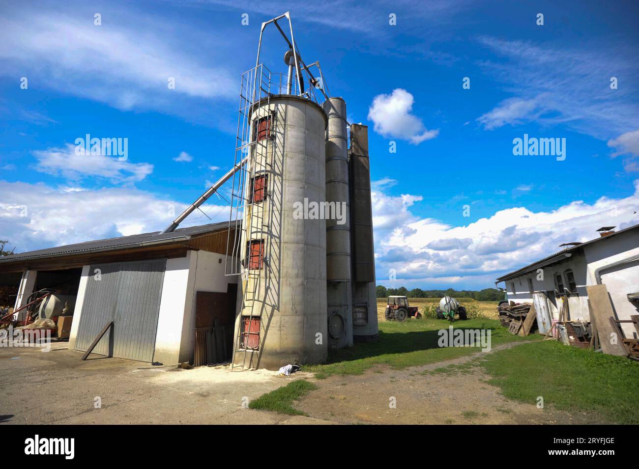 Silo towers for storing bulk materials Stock Photo - Alamy