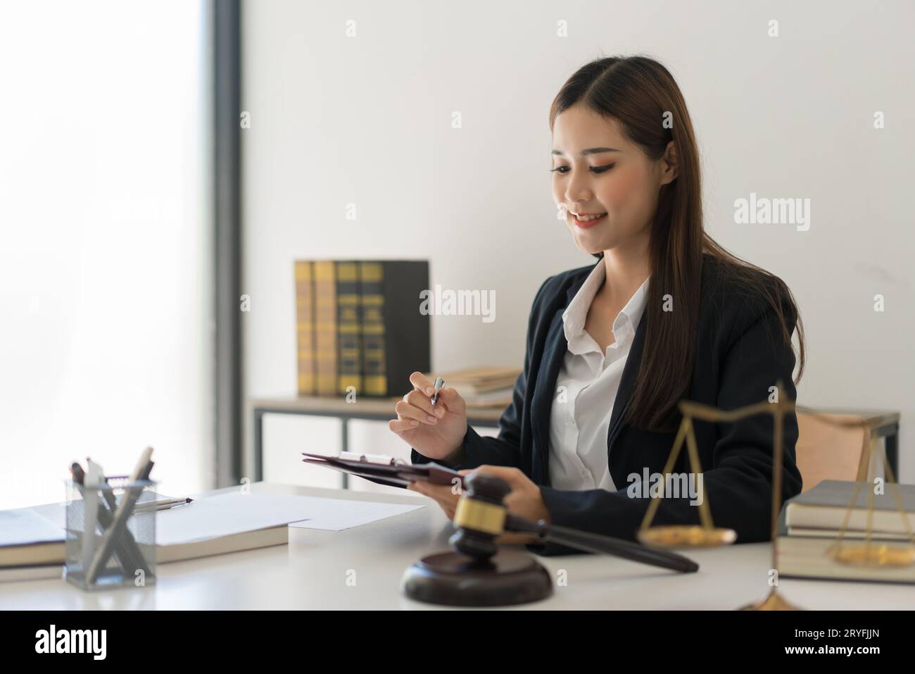 Legal and justice concept, Female lawyer writing contract about ...