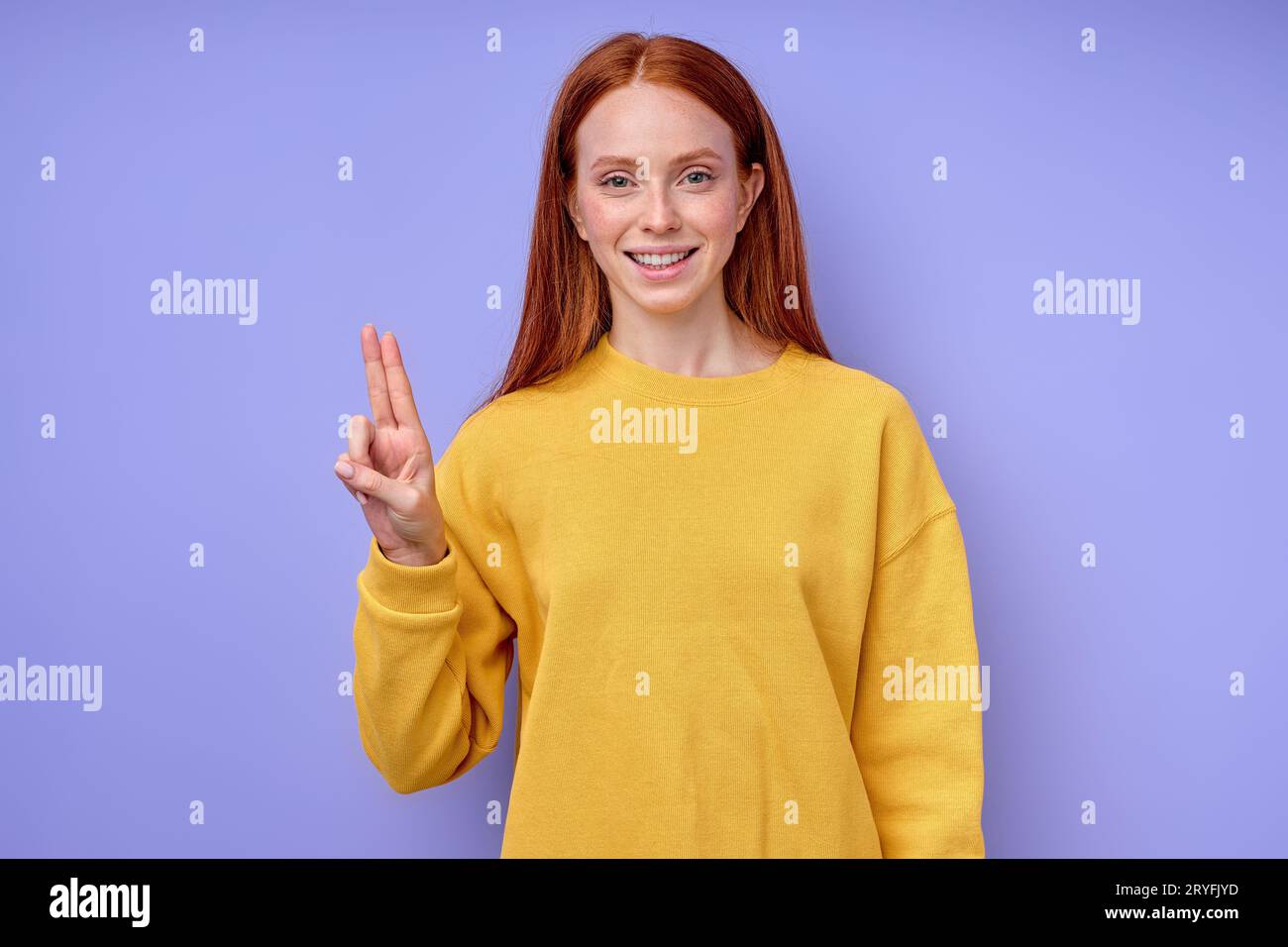 letter U spelling by girl's hand in American Sign Language (ASL) on ...