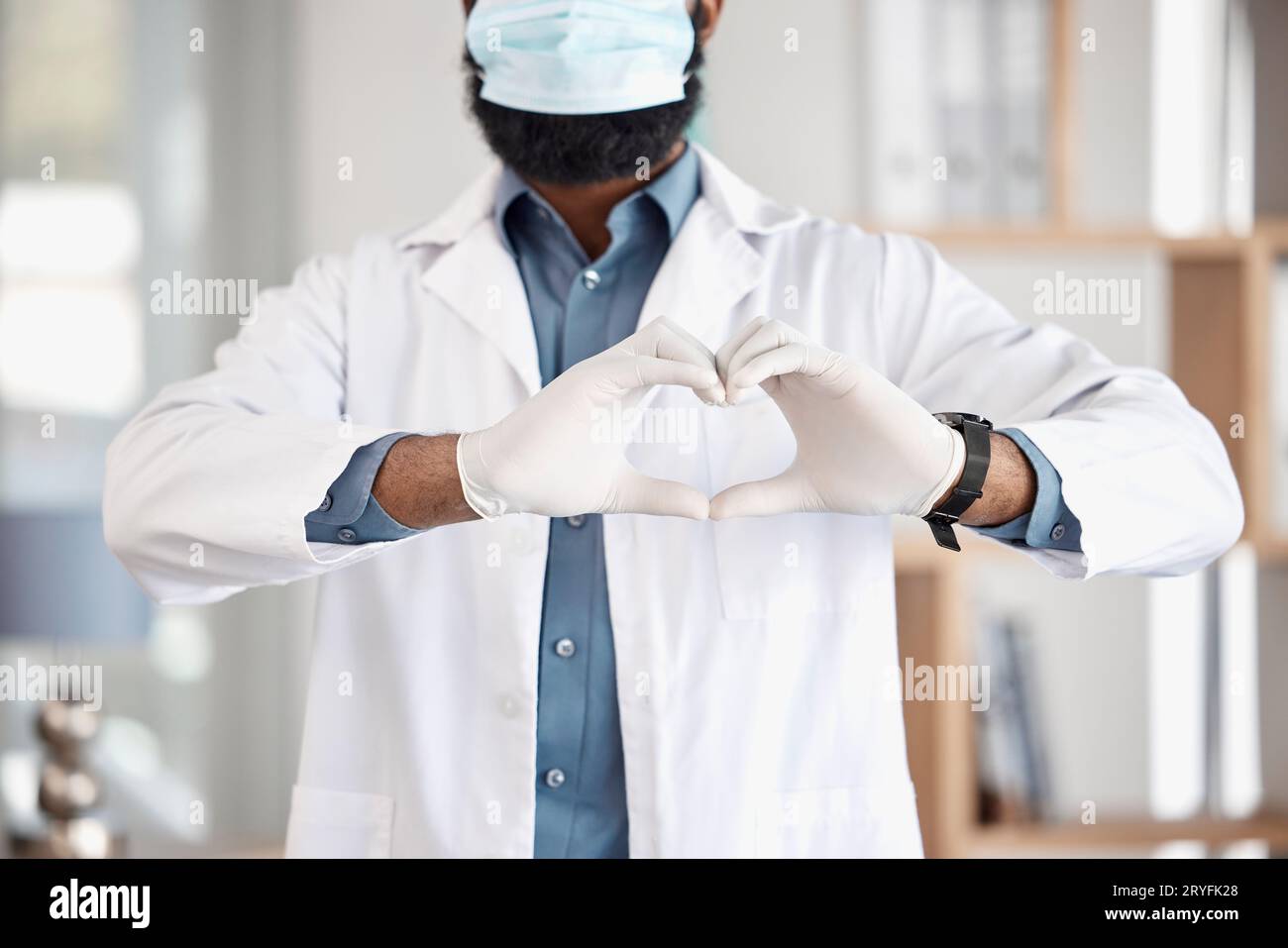 Doctor, hands and heart sign with mask for safety, healthcare and ...