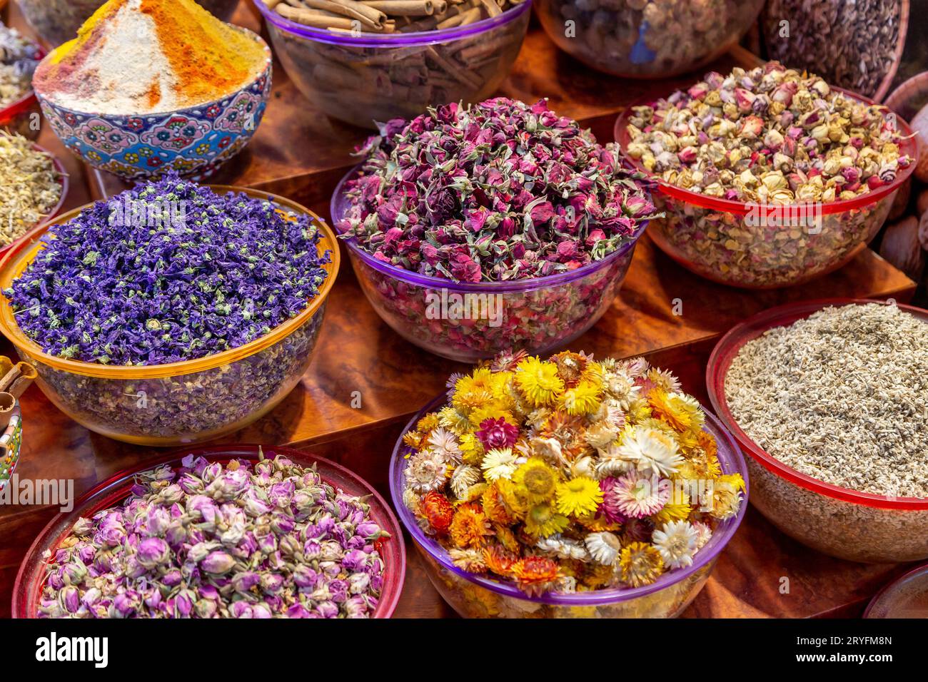 Variety of Arabic spices and dried flowers in the traditional market in ...