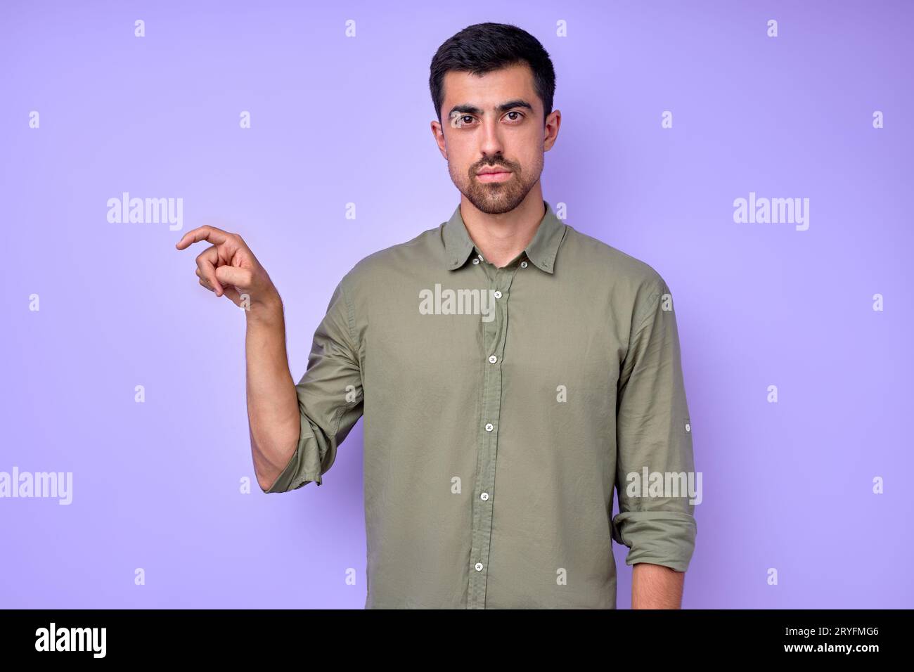 serious handsome man showing letter X x with fingers .the Alphabet in ...