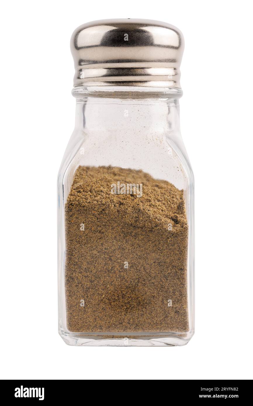 Glass pepper pot with ground black pepper isolated on white background ...