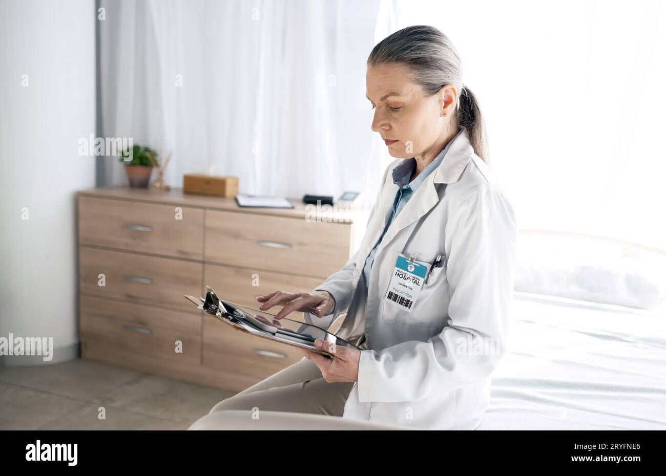 Healthcare, woman and doctor with tablet on bed for communication ...