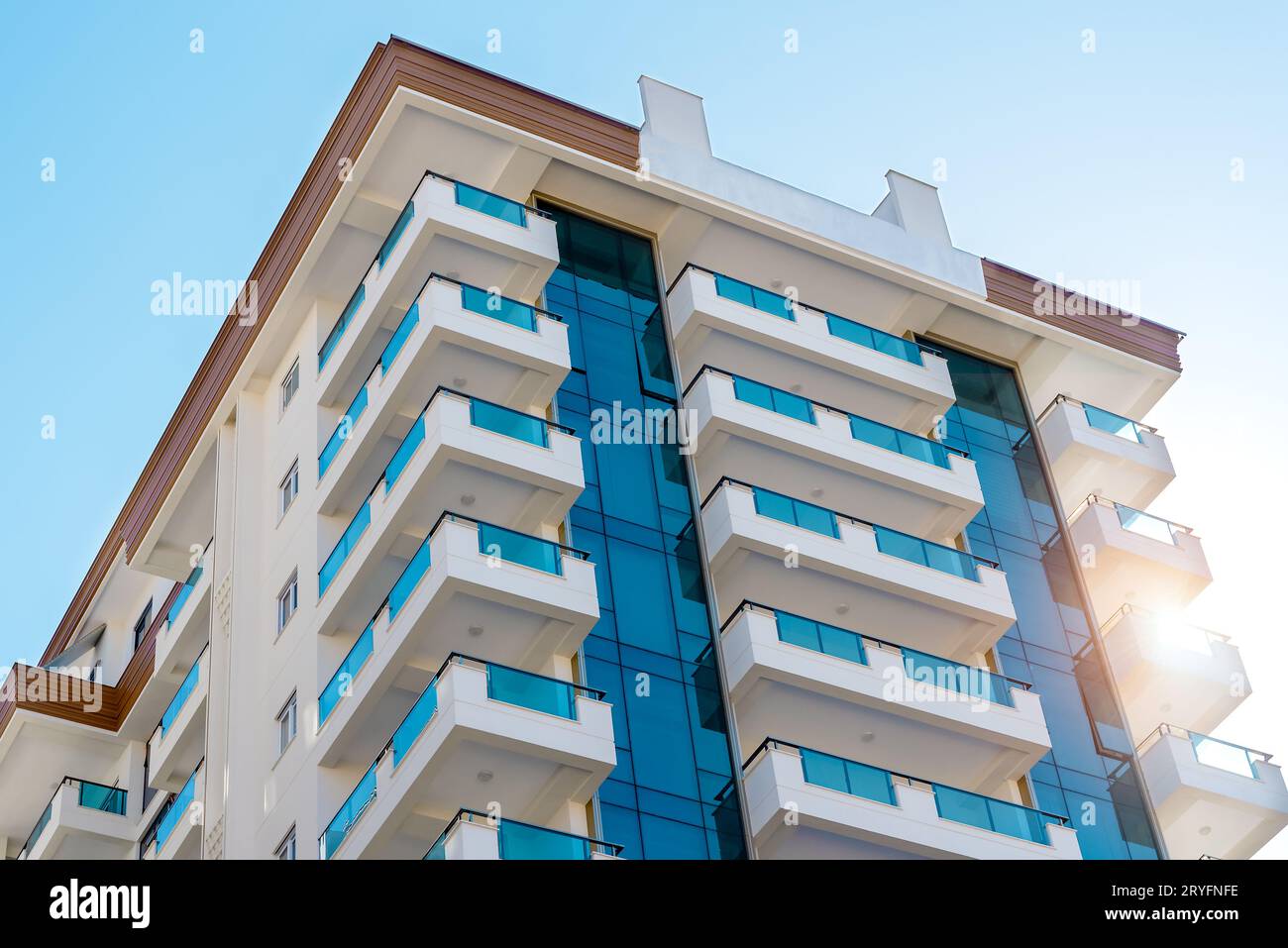 Corner of a residential apartment building against the blue sky Stock ...