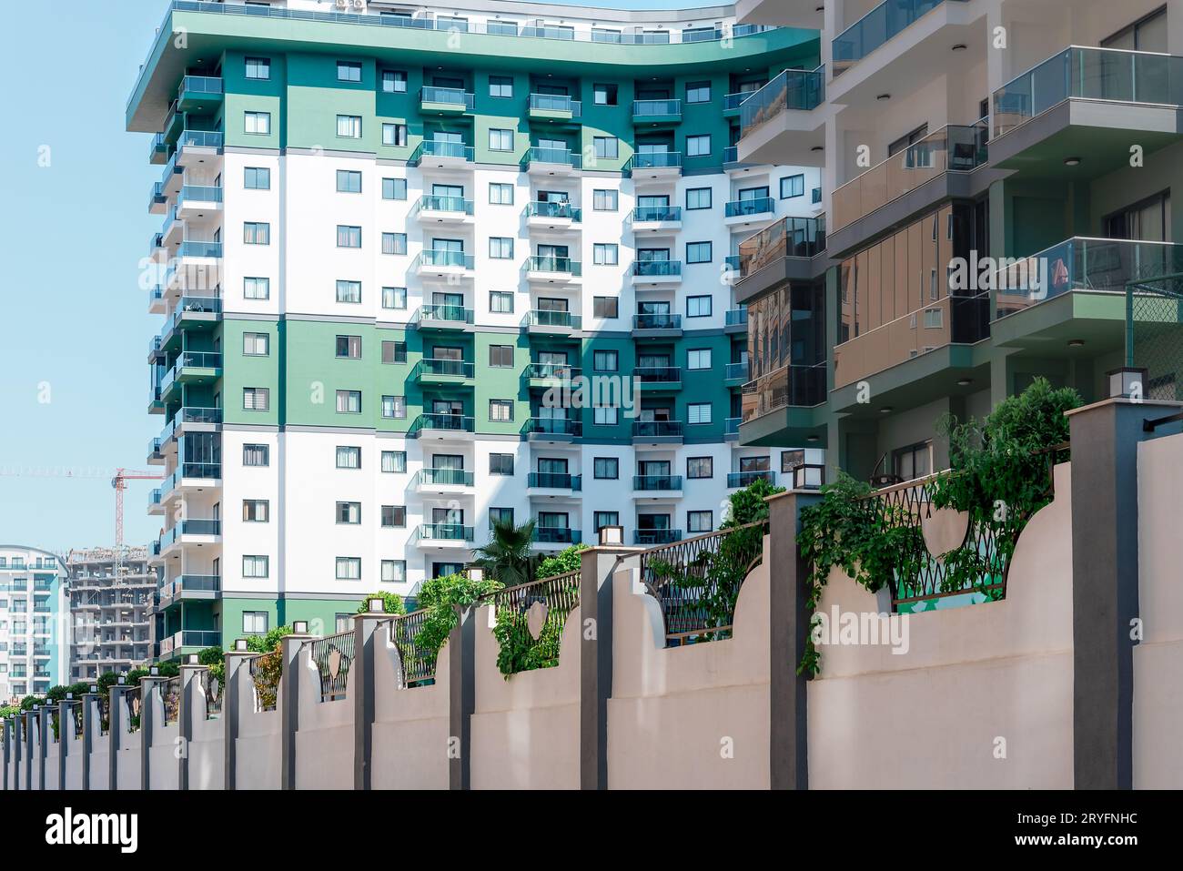 Fashionable residential apartment complex behind a fence Stock Photo ...