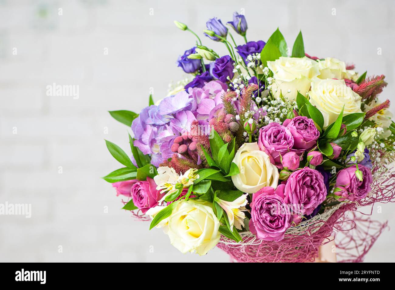 Beautiful bouquet with roses, peony roses, hortensia, and lisianthus ...