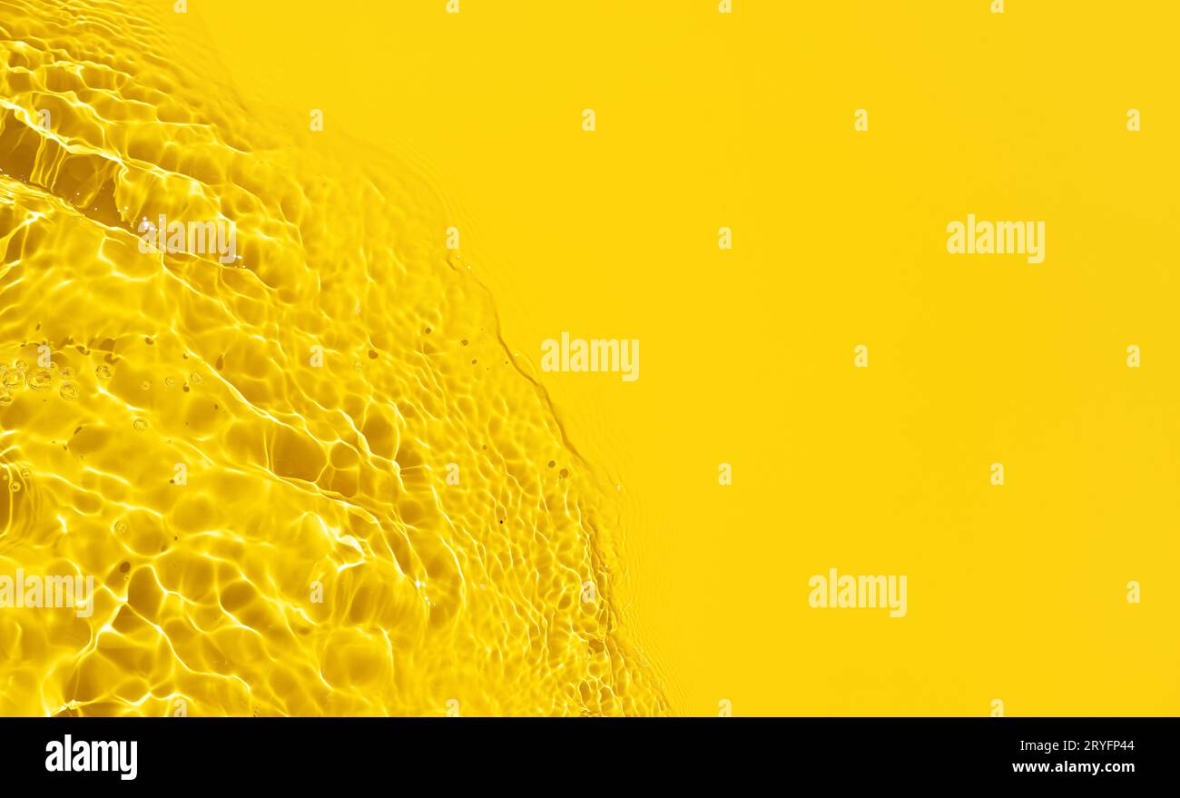 Yellow Abstract background texture with water ripples and waves. Copy ...