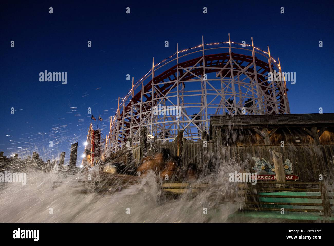 Amusement park at night Stock Photo - Alamy