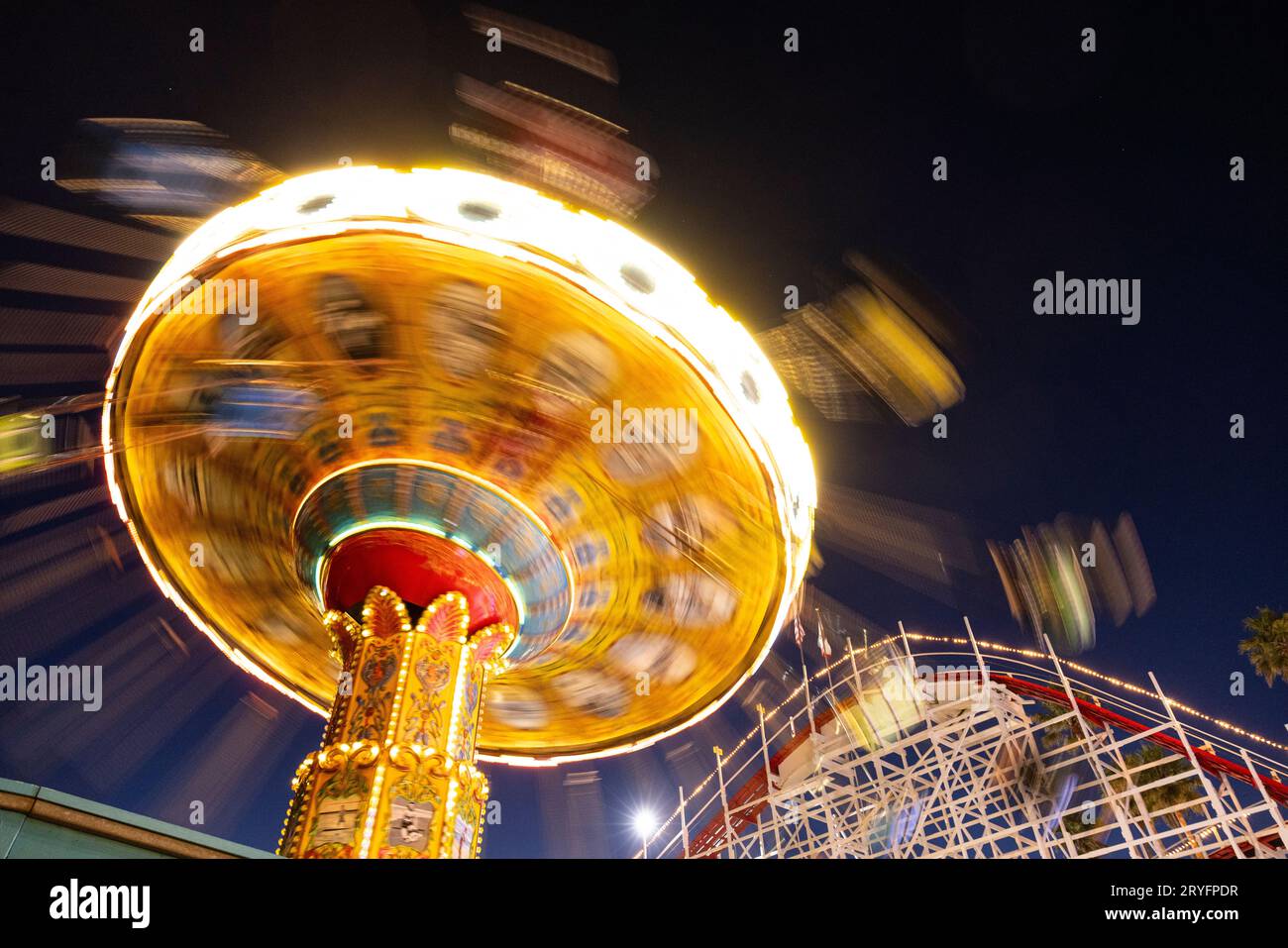 Amusement park at night Stock Photo - Alamy