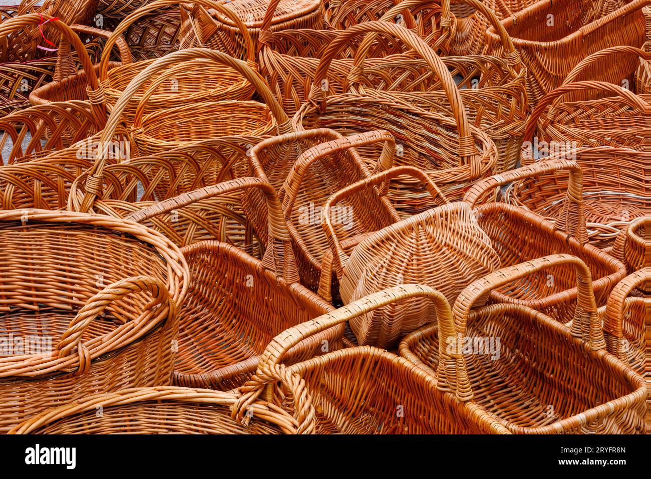 A lot of of many wicker baskets for sale - closeup full-frame background Stock Photo - Alamy