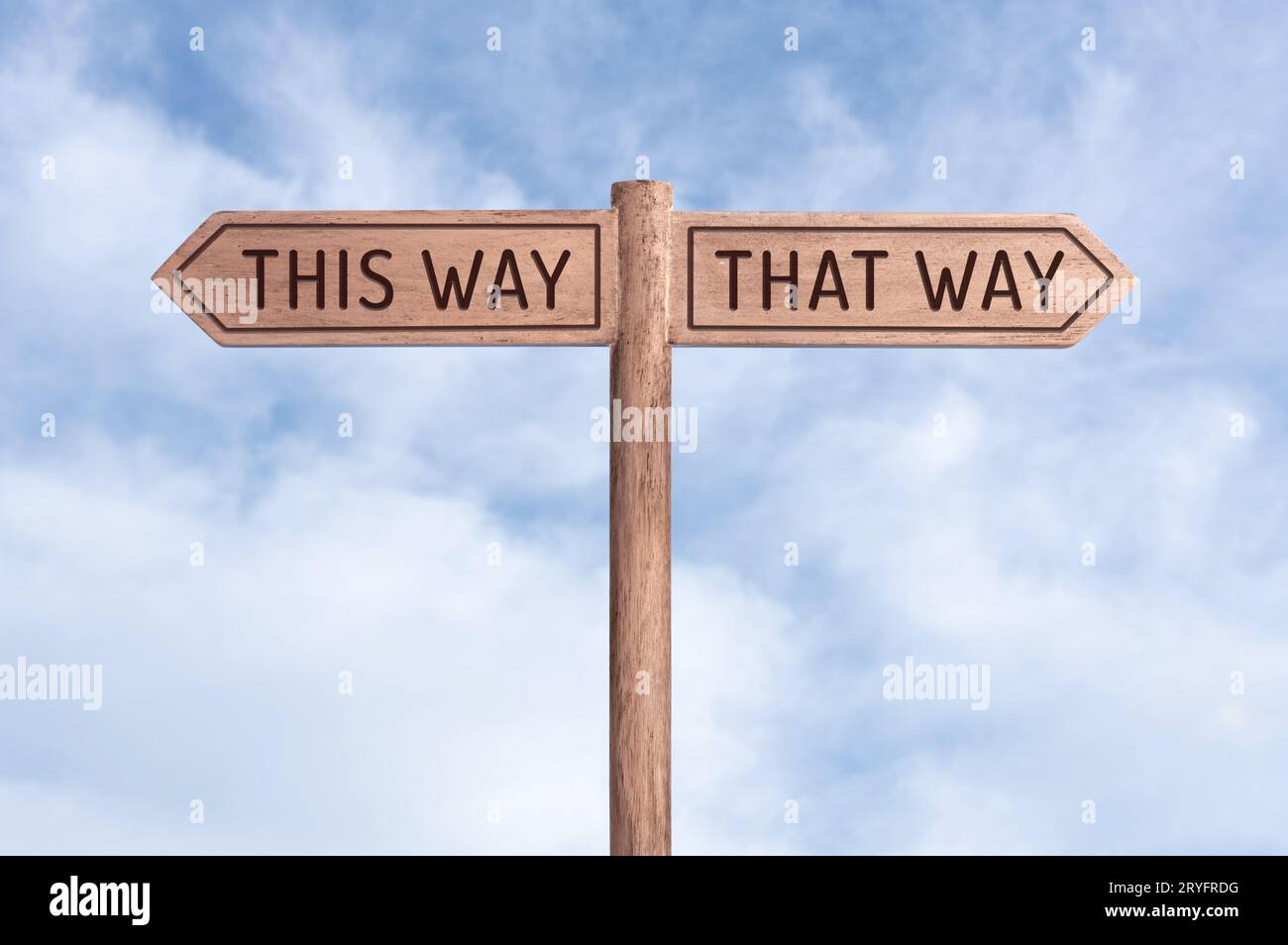This way or That Way concept. Words in opposite directions on signpost ...
