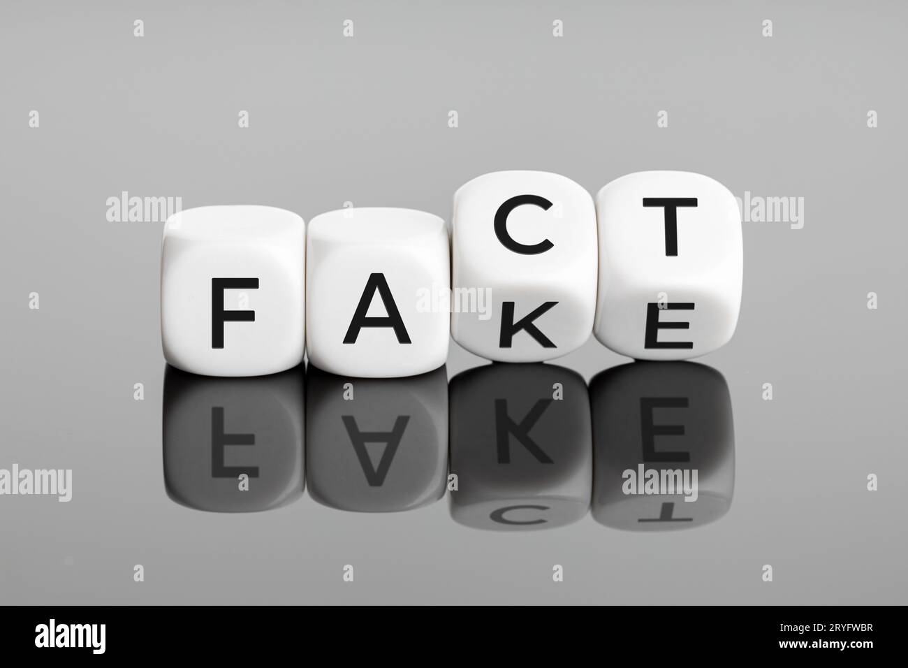 Fact or Fake concept. Flipping white blocks with text Stock Photo - Alamy