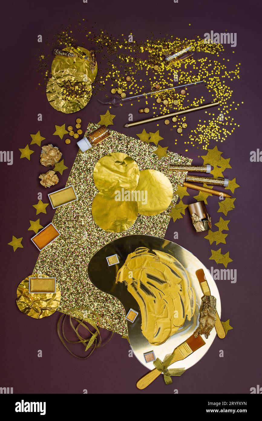 Gilding accessories in golden color. Gold plate art and gilding. During ...