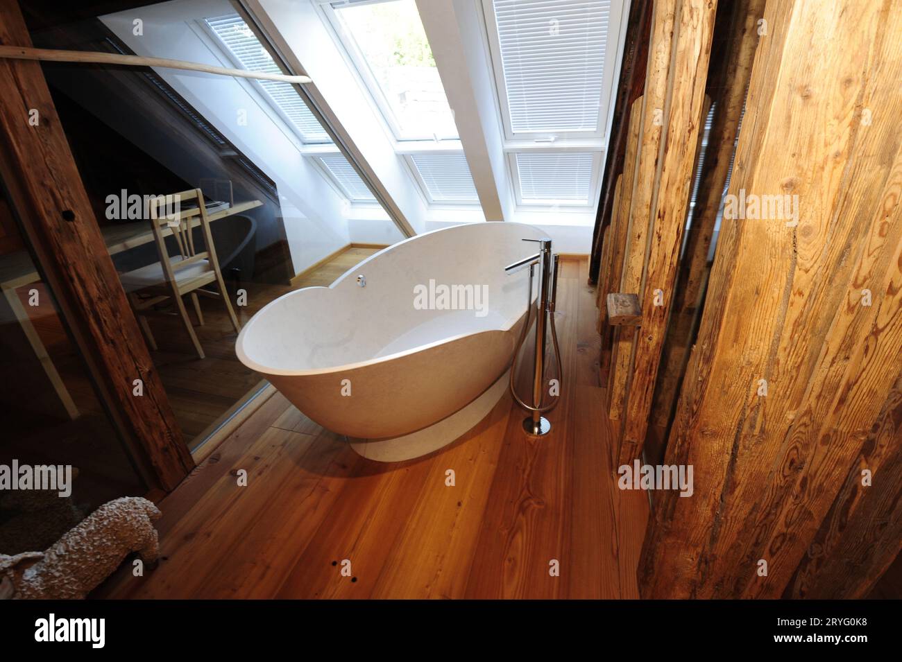 A bathtub in a bathroom Stock Photo - Alamy