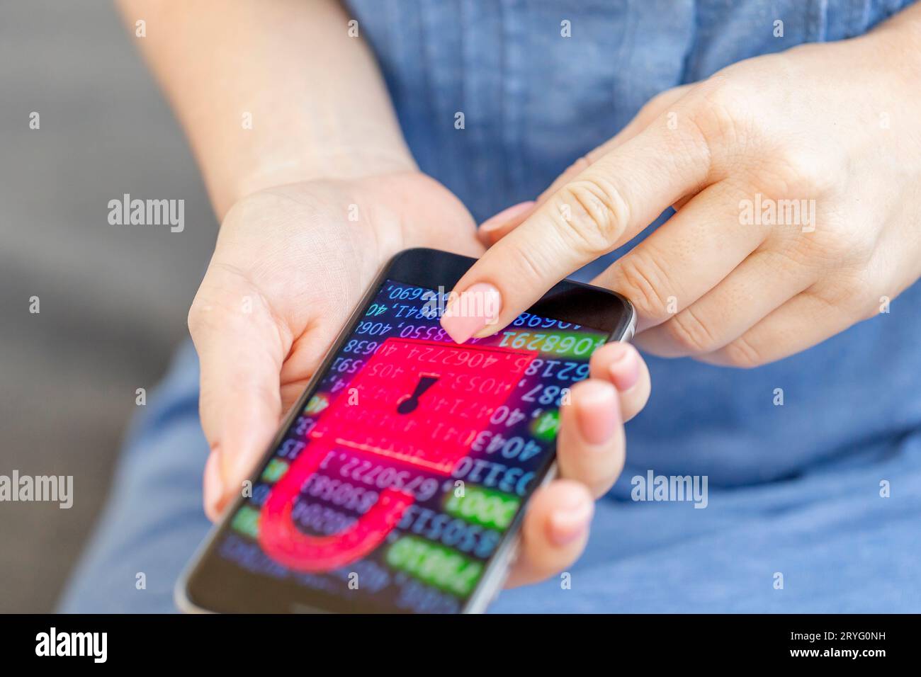 Mobile phone in female hands with screen showing compromised virus ...
