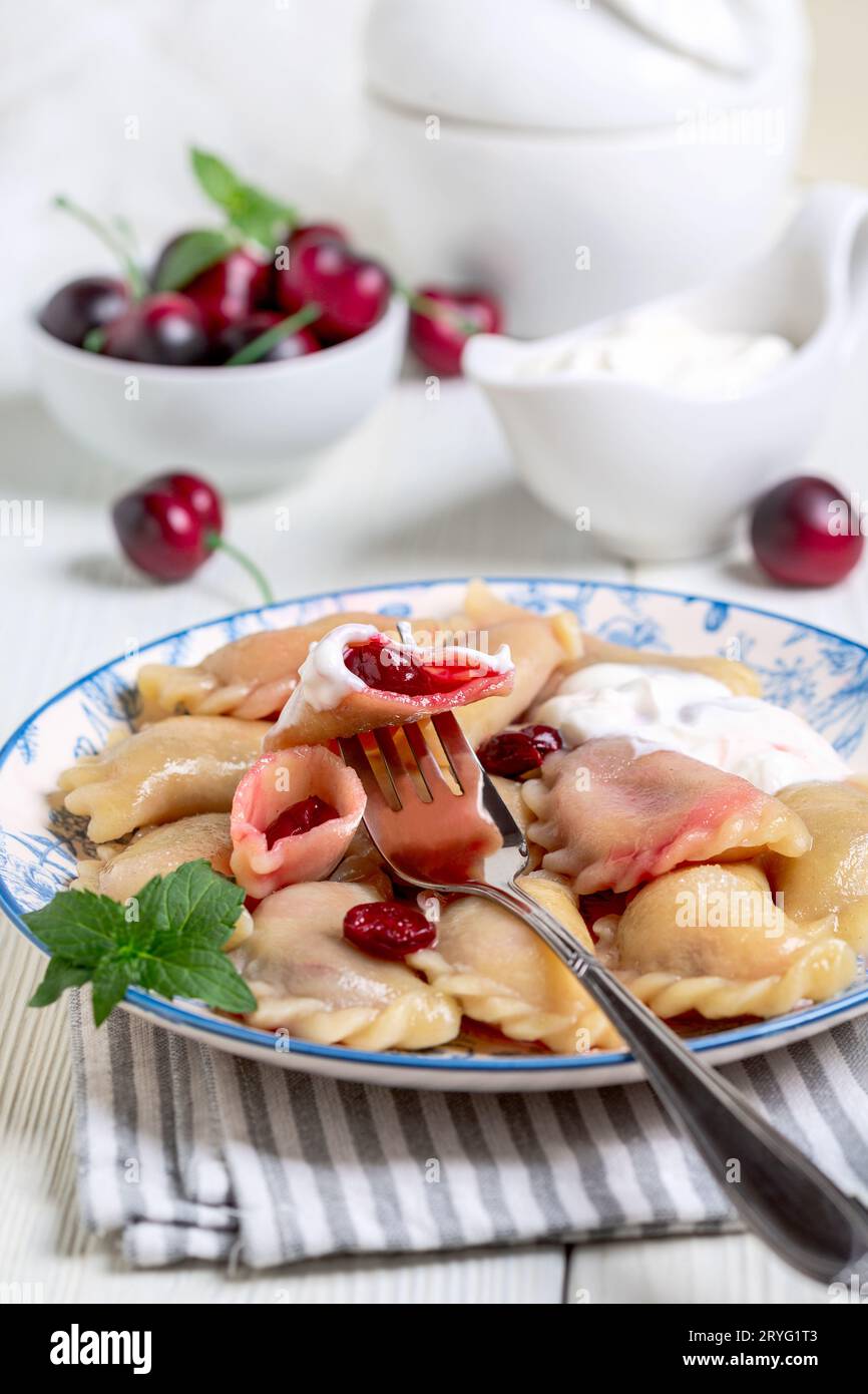 Homemade dumplings with cherries Stock Photo - Alamy