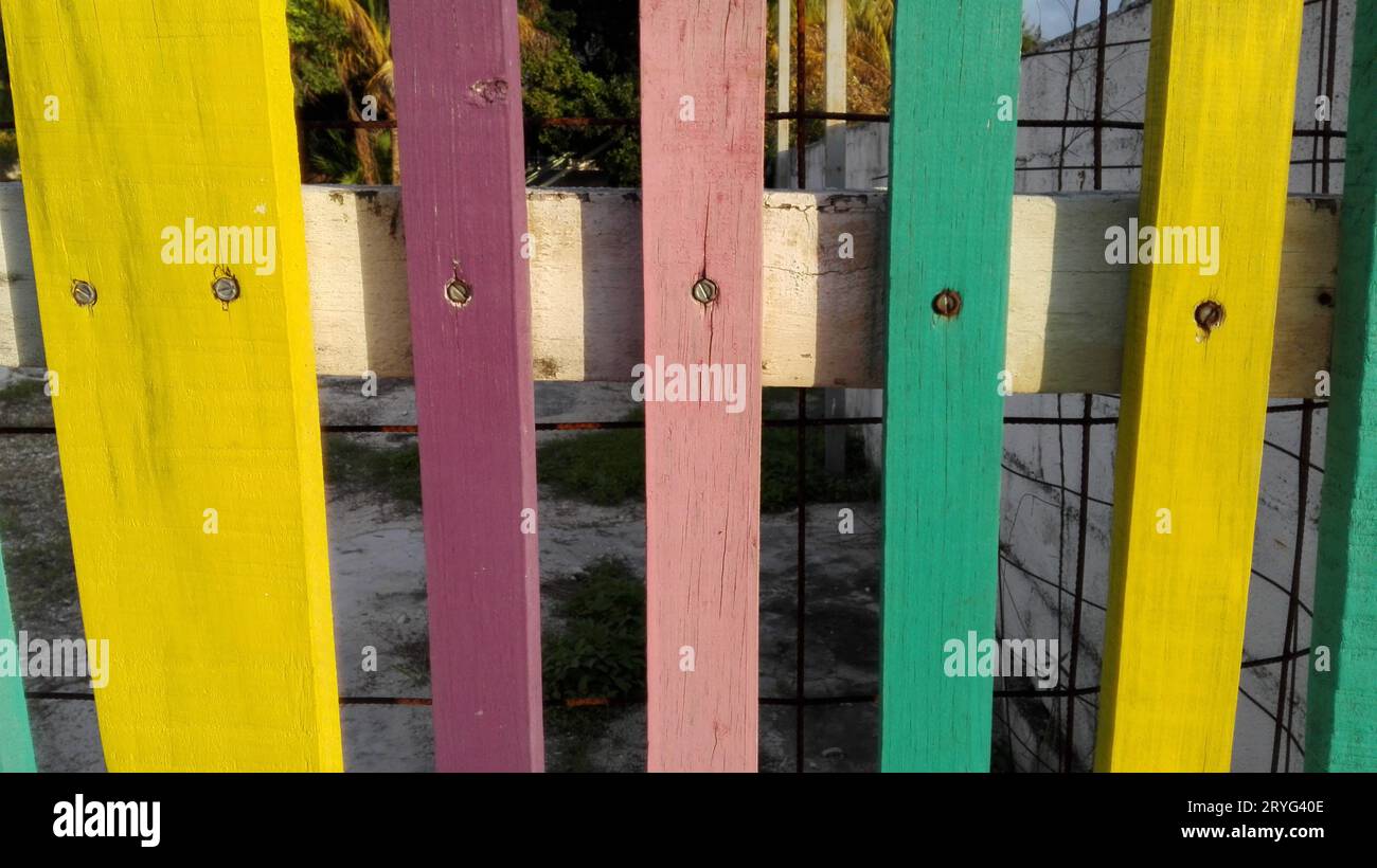 Wooden fence as demarcation to other land Stock Photo - Alamy