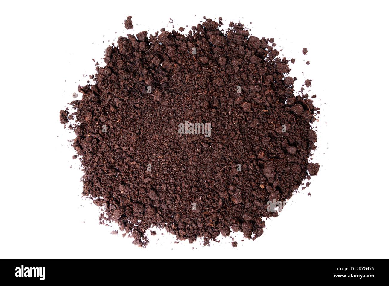 Close-up top view of a small mound of soil isolated on a white ...
